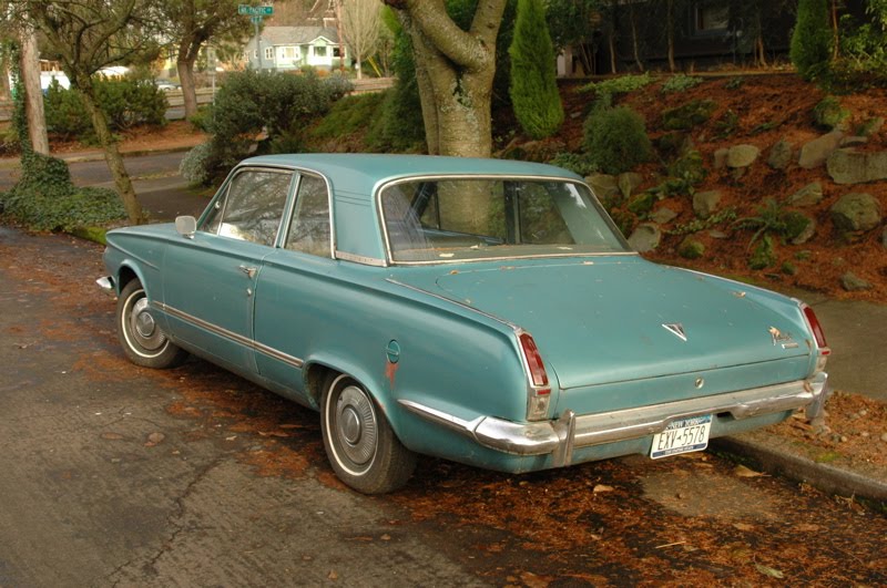 OLD PARKED CARS.: 1964 Plymouth Valiant Hardtop.