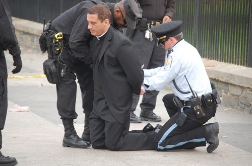 Father Geoff Farrow: Why I handcuffed myself to the White House fence.