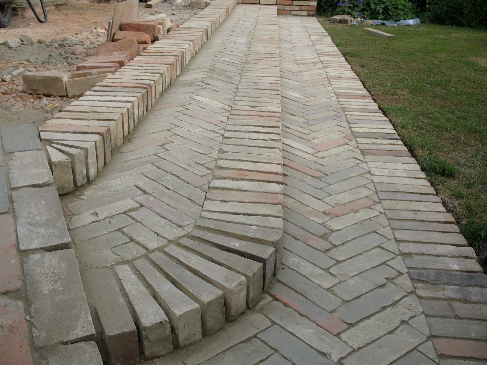 Circles: Reclaimed Brick Herringbone Steps and York Stone Terrace Extension