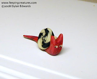 Feeping Creatures:Feep o' the Morning: Red & Black Cat Snail (Snat)