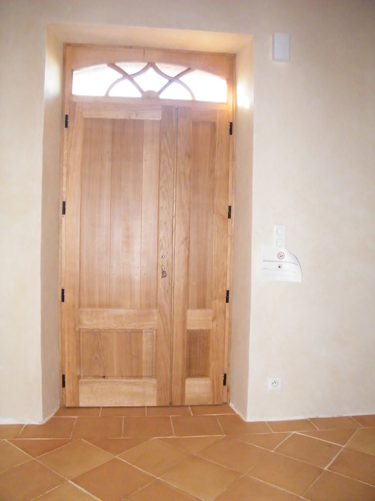 evolution-bois: porte d'entrée en chêne avec imposte cintré