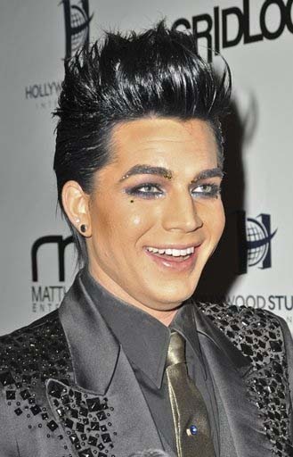 IT'S PAMELA ANDERSON AND ADAM LAMBERT