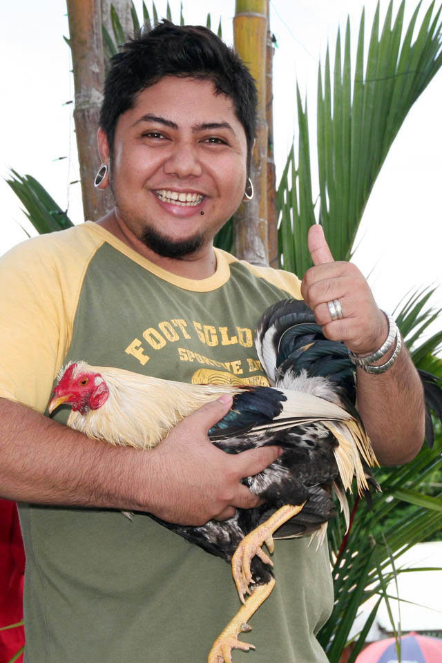 View thru My Global Lens: A Man and His Rooster