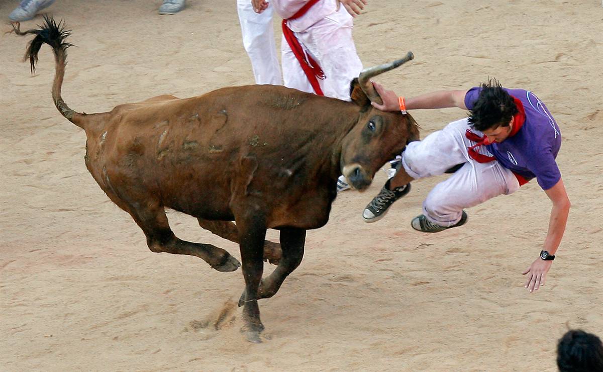 Global Attractions: Spain Celebrates Bull Fight in Pamplona