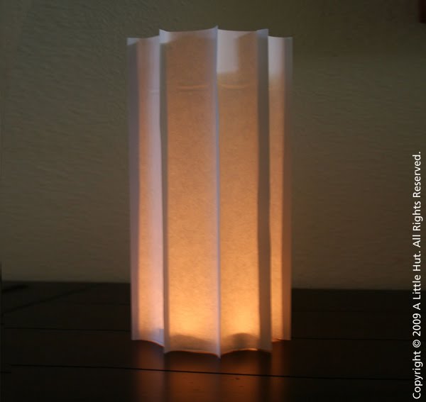 A Little Hut - Patricia Zapata: simple paper hurricane cover