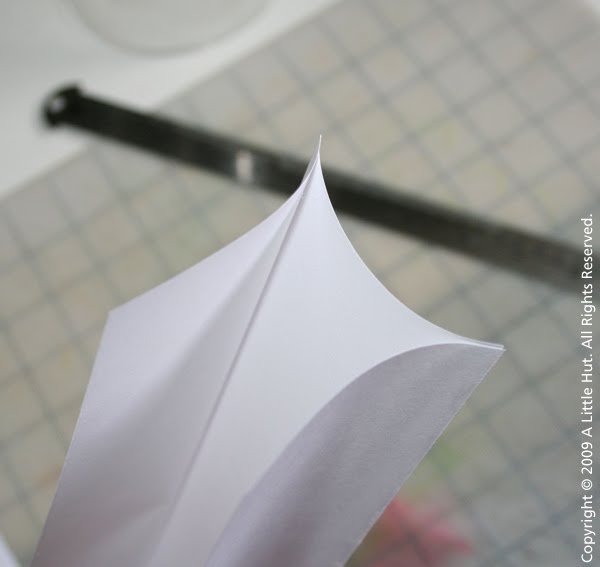 A Little Hut - Patricia Zapata: simple paper hurricane cover