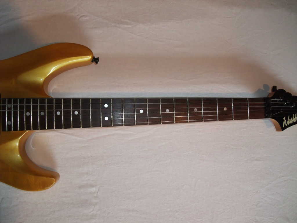 So many guitars, so little talent: Washburn #6 - 'KC90 V' transparent gold