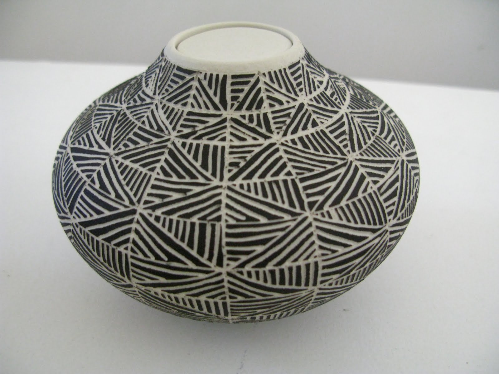 DANA LIGHTBOURNE BECHERT: Carved Porcelain Forms