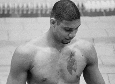 world to tattoo design: Tim Duncan Tattoos