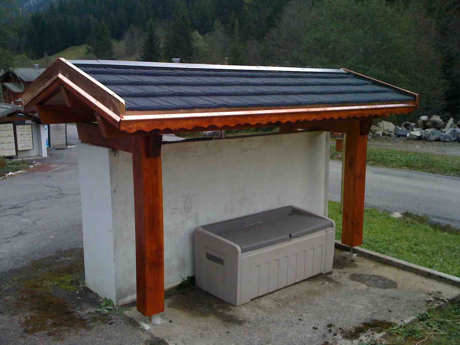 Splashes from our waterfall: Pictures: New roof over the sign