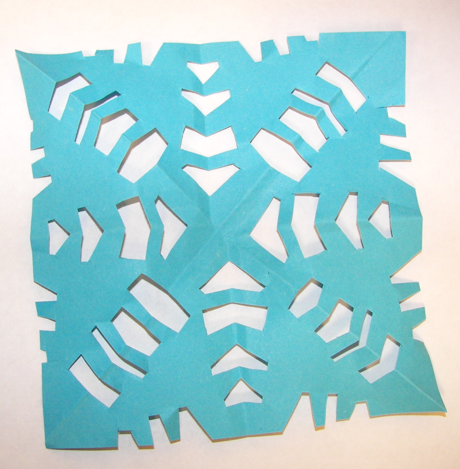 Organized Chaos: 1st and Kindergarten Kirigami (snowflakes)
