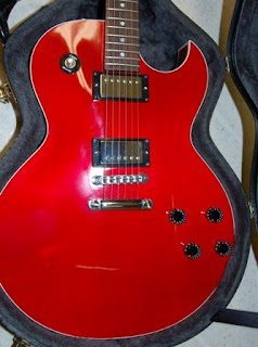 Rex and the Bass: 2003 Gibson ES-135 Guitar