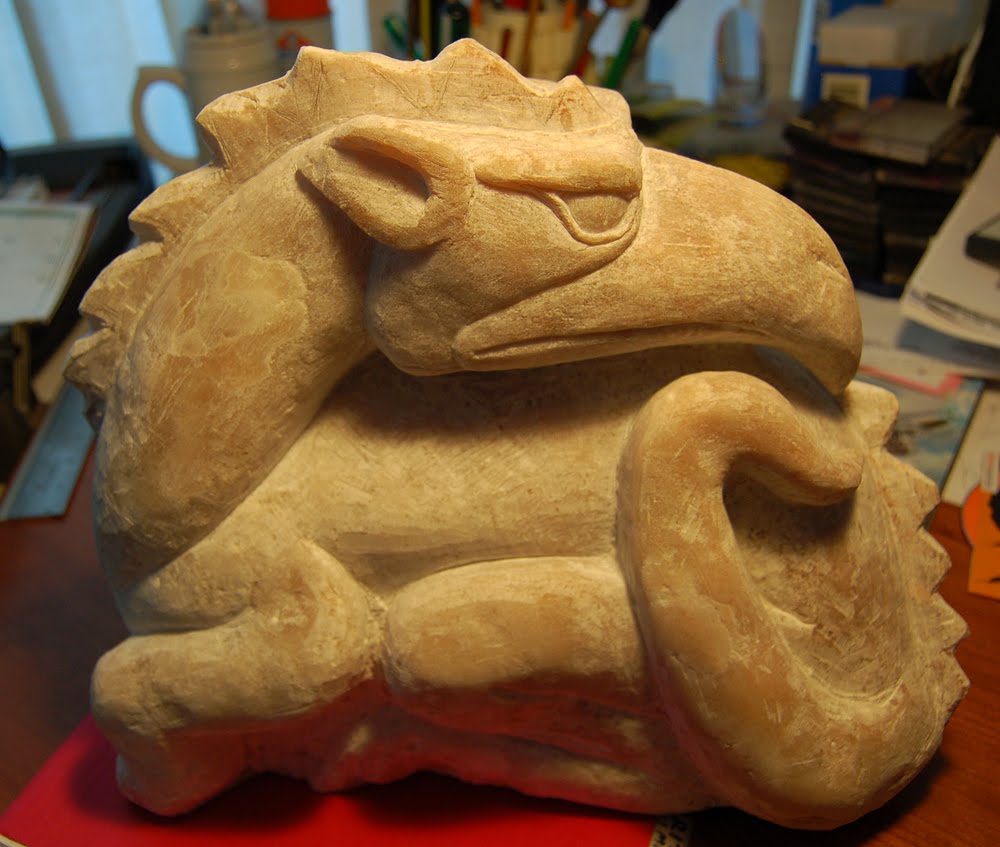 A Burning Designer: Petrified Baby Dragon