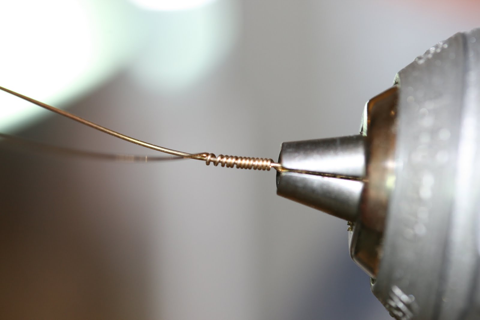 Making a wire coil quickly using a wire as the mandrel.