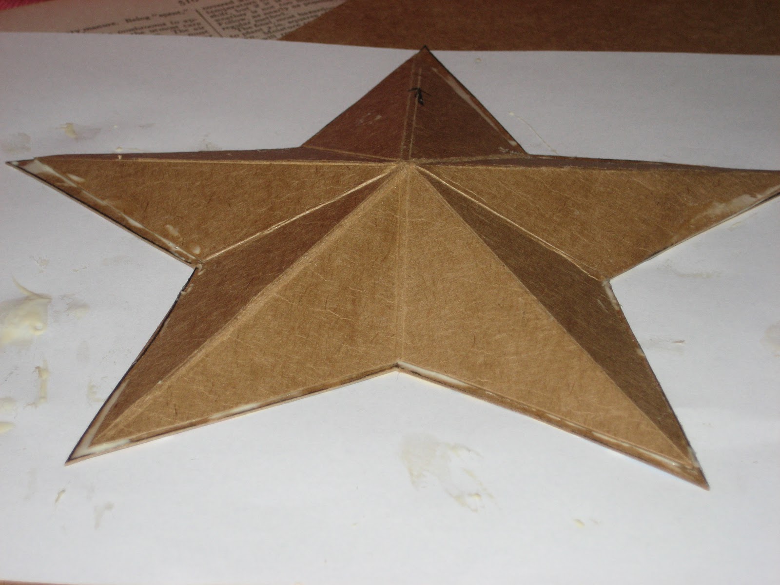 Remember how we cut out the base piece generously? Now you can trim it ...