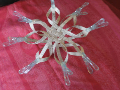 While the glue is setting on your star, you can create a hanger. Take ...