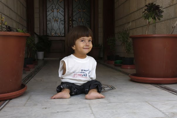 Boy with no arms | The only way to predict the future is to create it