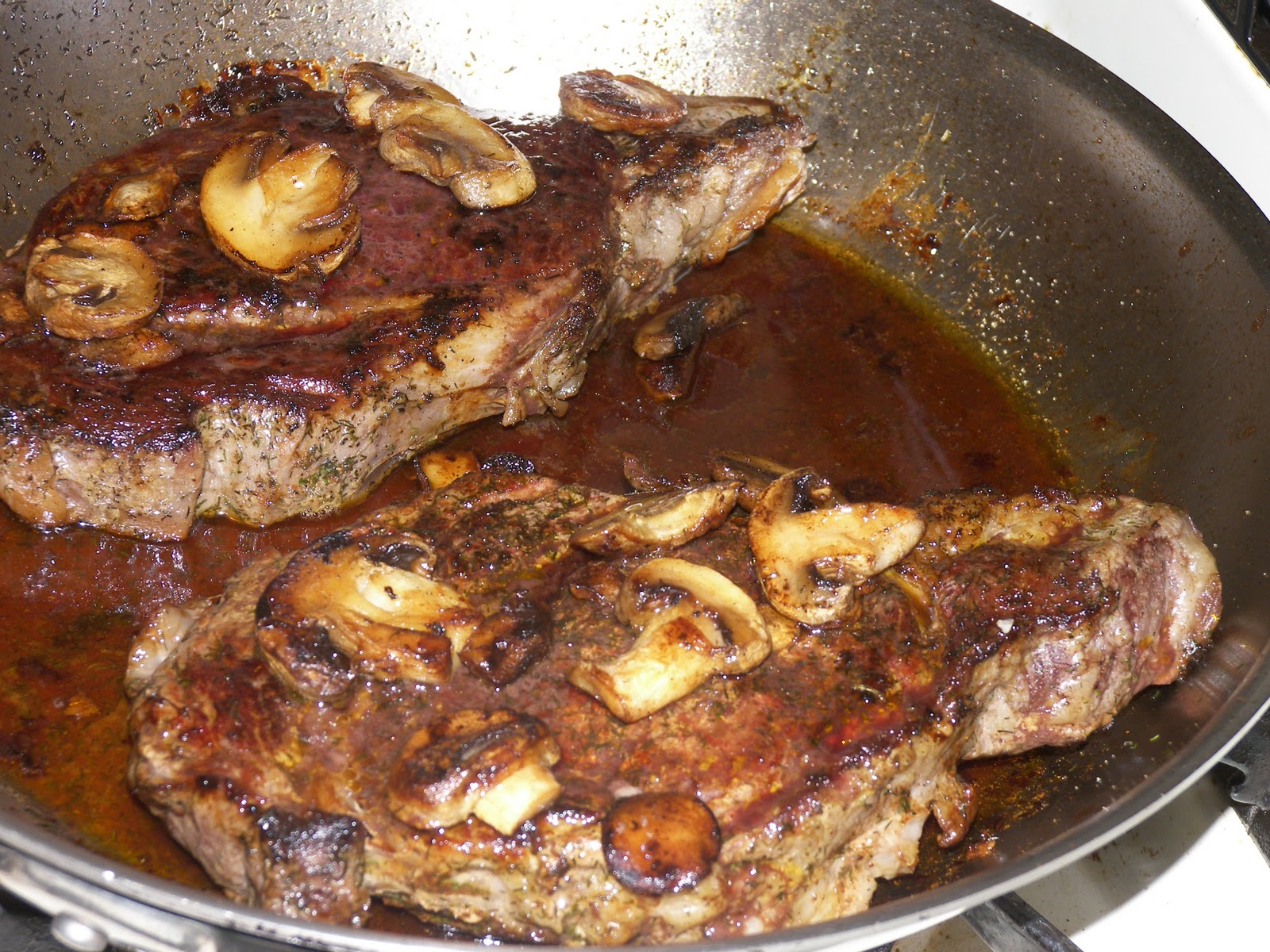 Cooking Delicious Food: Ribeye steaks with mushrooms, yummy