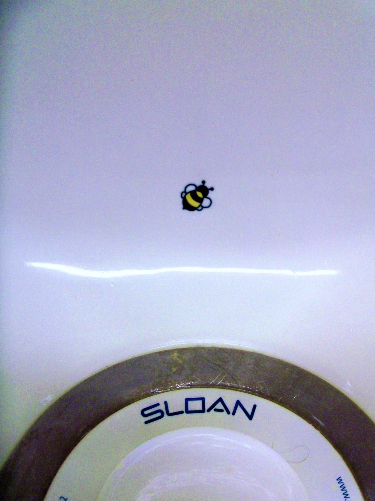 TIL that urinals have fly stickers because giving men something to aim ...