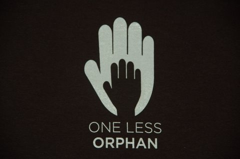 Love makes a family: One Less Orphan T-Shirts