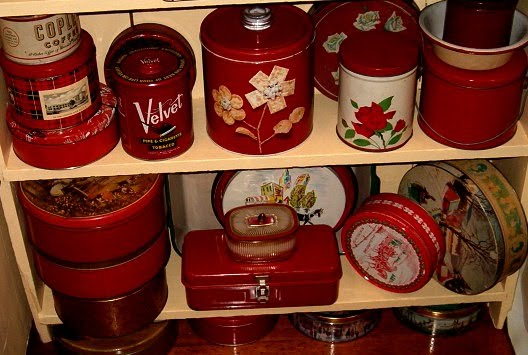 a conversation at goodwill: Red tins and new finds