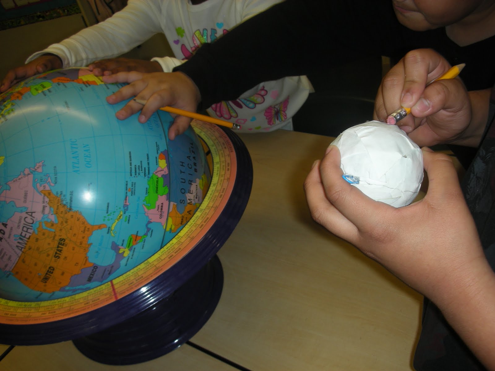 Students rock the Simple Gifts globe project | word.