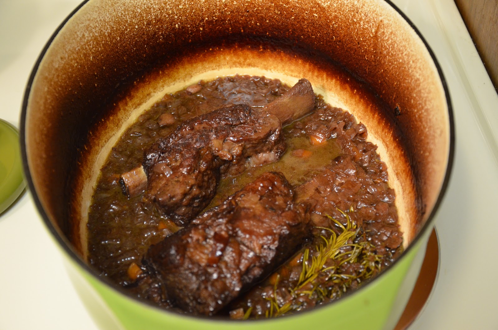 food for scot: Braised Short Ribs over Creamy Goat Cheese Polenta