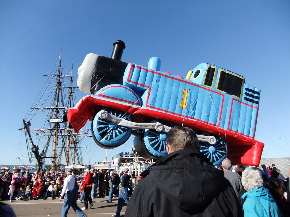one boy, one girl: Holiday Bowl's Big Bay Balloon Parade