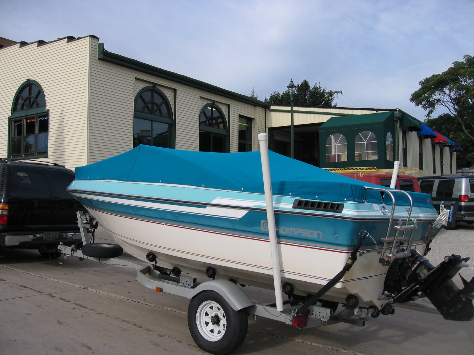 Homestyle Custom Upholstery and Awning: Custom Blue Boat Top
