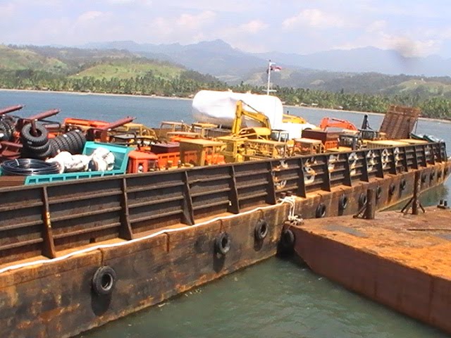 EURALIA PAINE: Pontoons with logging equipment at Oro Bay