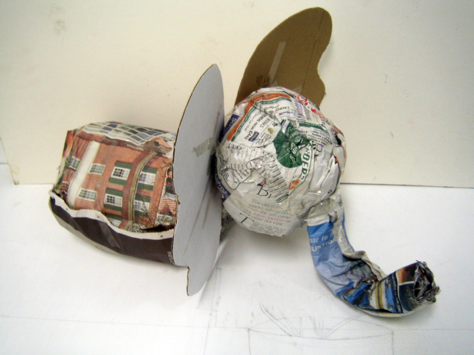 Emily Banthorpe's Recycling Project: Newspaper Animals