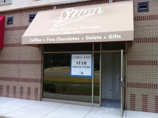 East 54 News and Events: Chocolaterie Stam Sign Goes Up