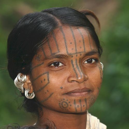 traditional tattoo in the face from India