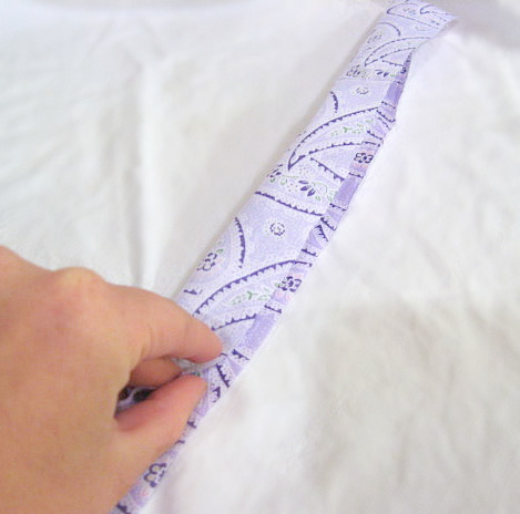 Fold your fabric in have lengthwise with the right sides together. Pat ...