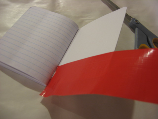 Basically, I took this little notebook, covered it in duct tape,